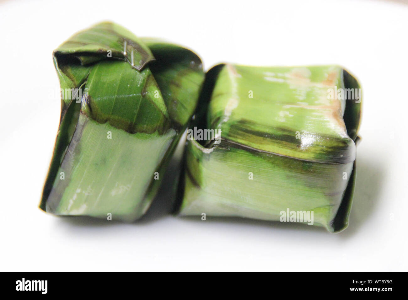 Wrapped in leaf hi-res stock photography and images - Alamy