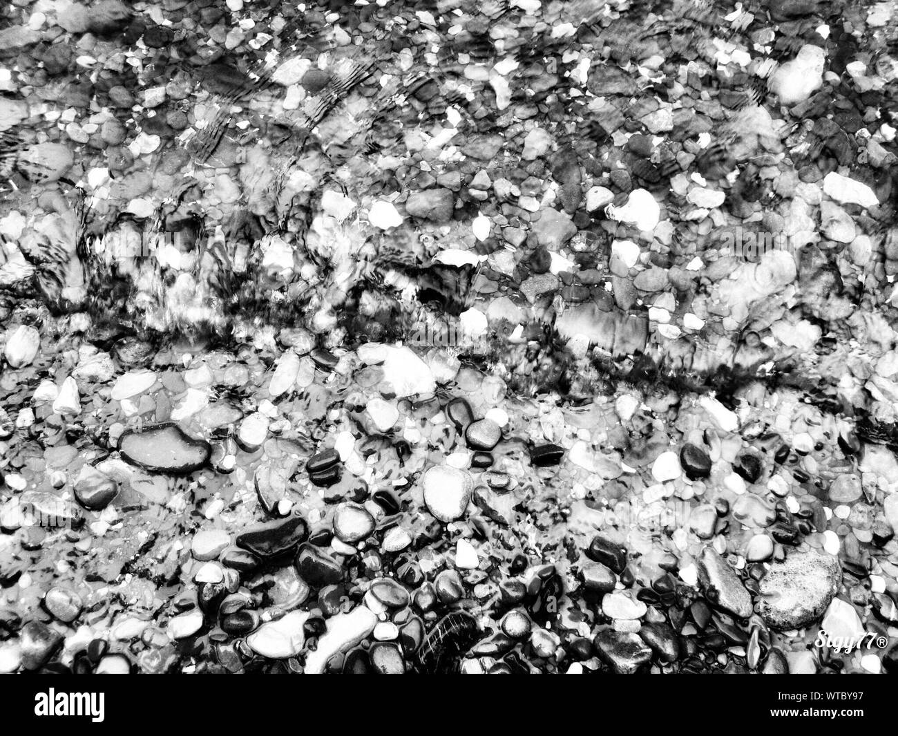 Pebbles in stream hi-res stock photography and images - Alamy