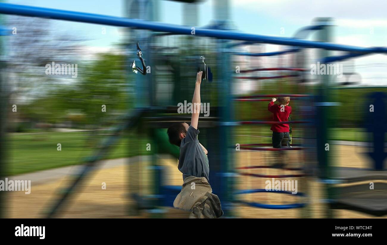 Monkey hanging bar hi-res stock photography and images - Alamy