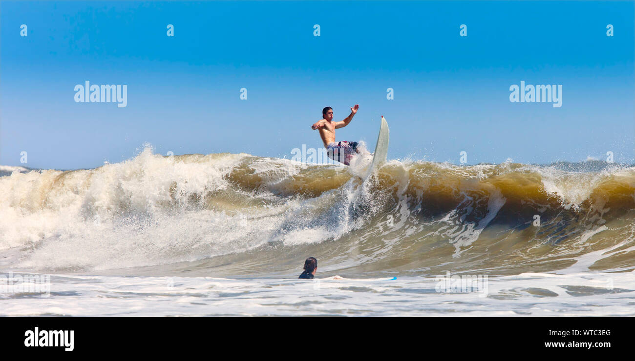Surfer getting air on hi-res stock photography and images - Alamy