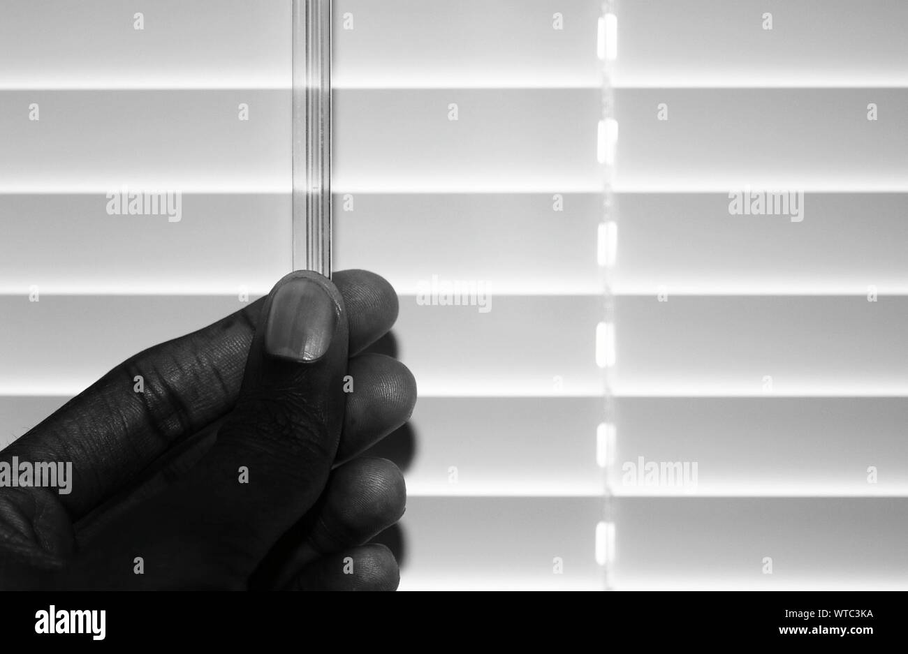 Hand Opening Blinds High Resolution Stock Photography and Images - Alamy
