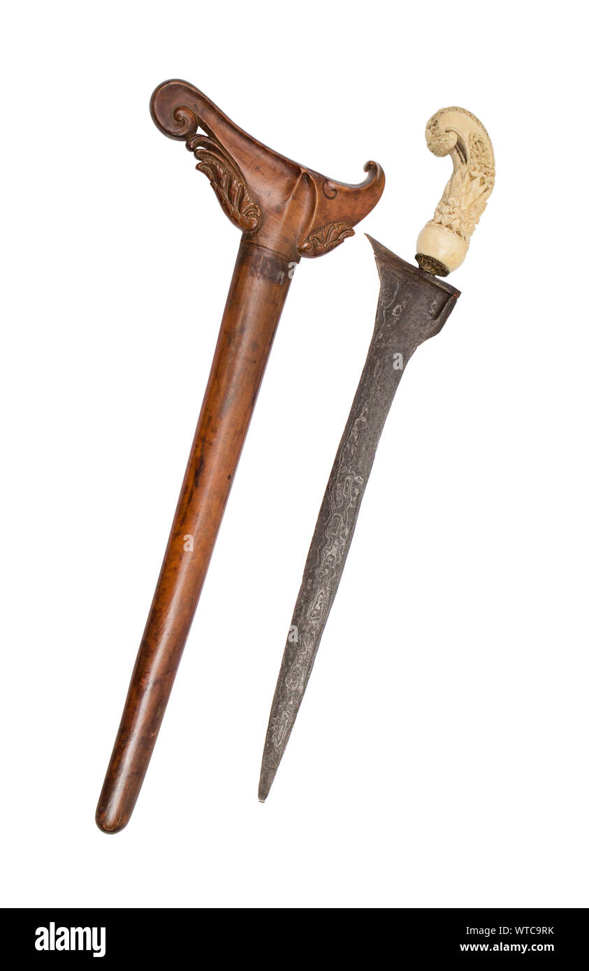 KRIS DAGGER. Carved ivory hilt, carved wood scabbard top Stock Photo ...