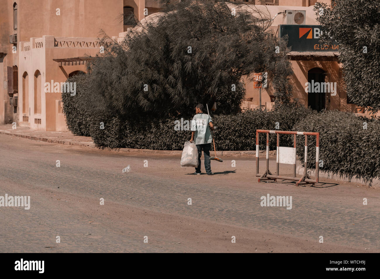Waste carrying man hi-res stock photography and images - Alamy