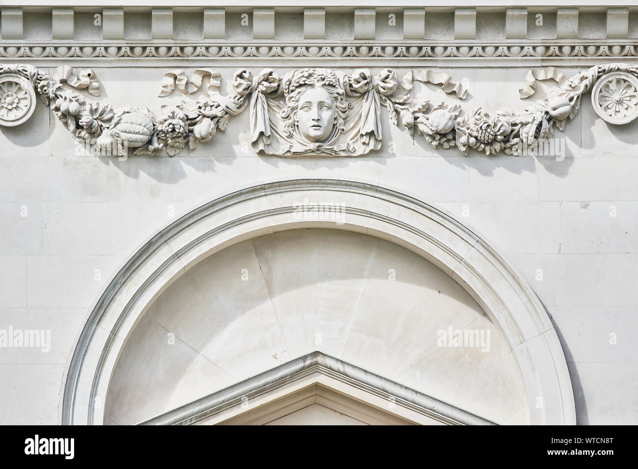 Decorated bas-relief on an outside wall of Senate House, university of ...