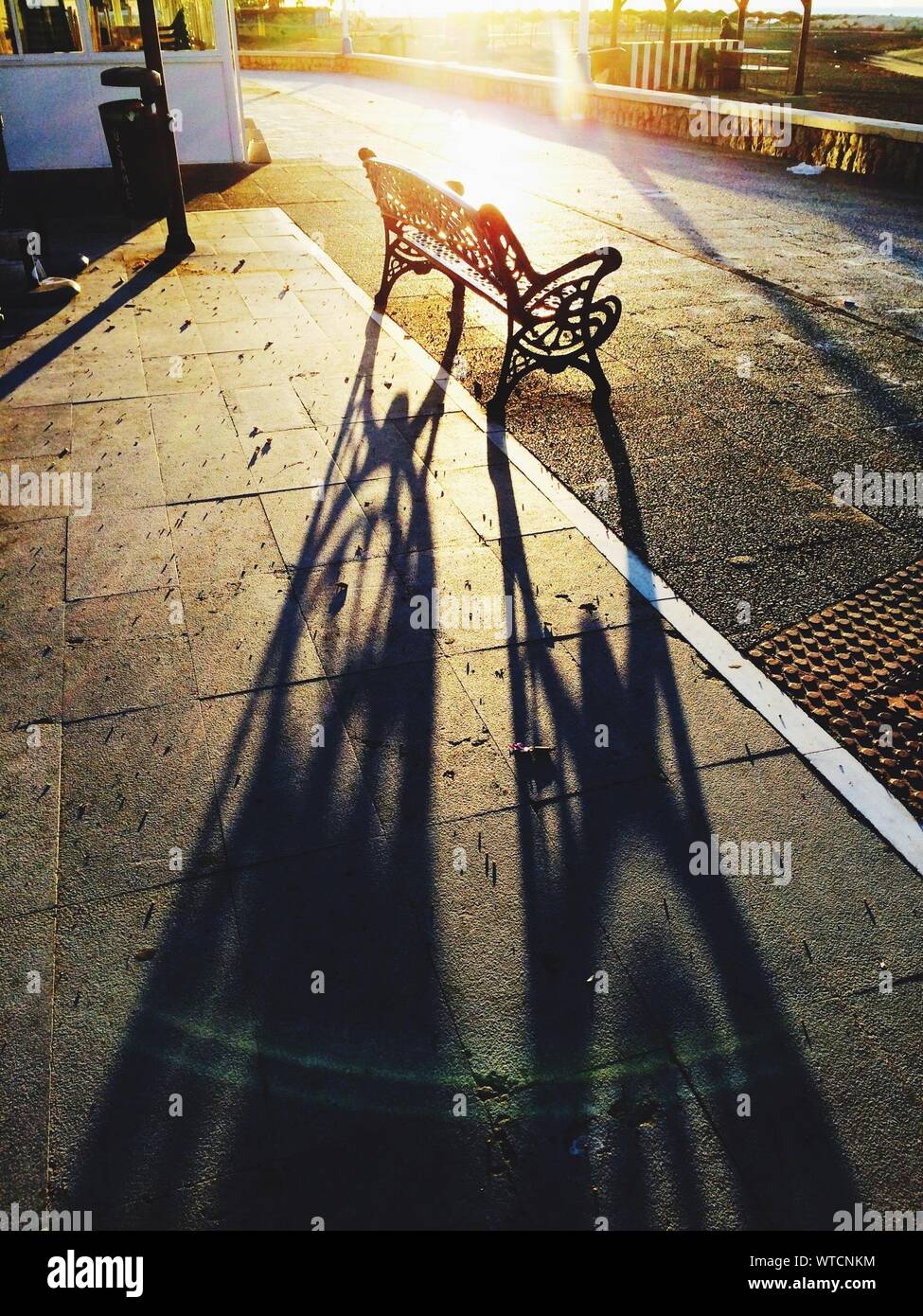 Bench on the street hi-res stock photography and images - Alamy