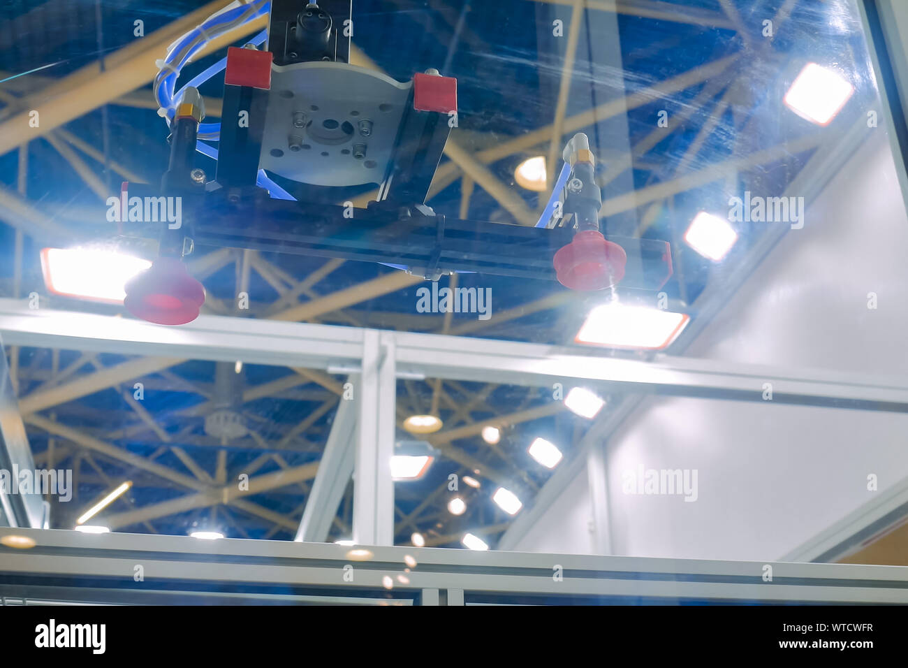 Automatic robotic arm manipulator with suction cups at plant - close up ...
