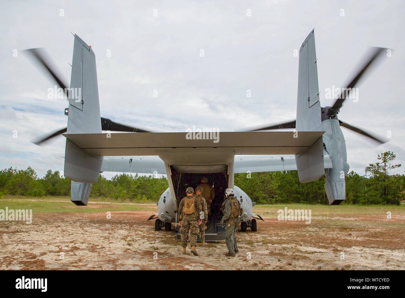 Midshipmen board a V-22 Osprey during Career Orientation Training for ...