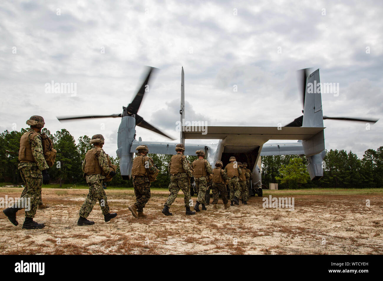 Midshipmen board a V-22 Osprey during Career Orientation Training for ...