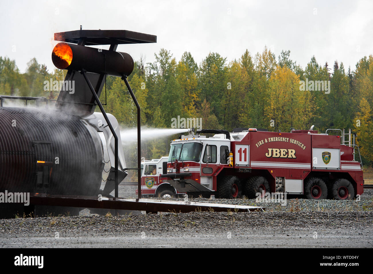 U.S. Air Force fire protection specialists with the 673d Civil Engineer ...