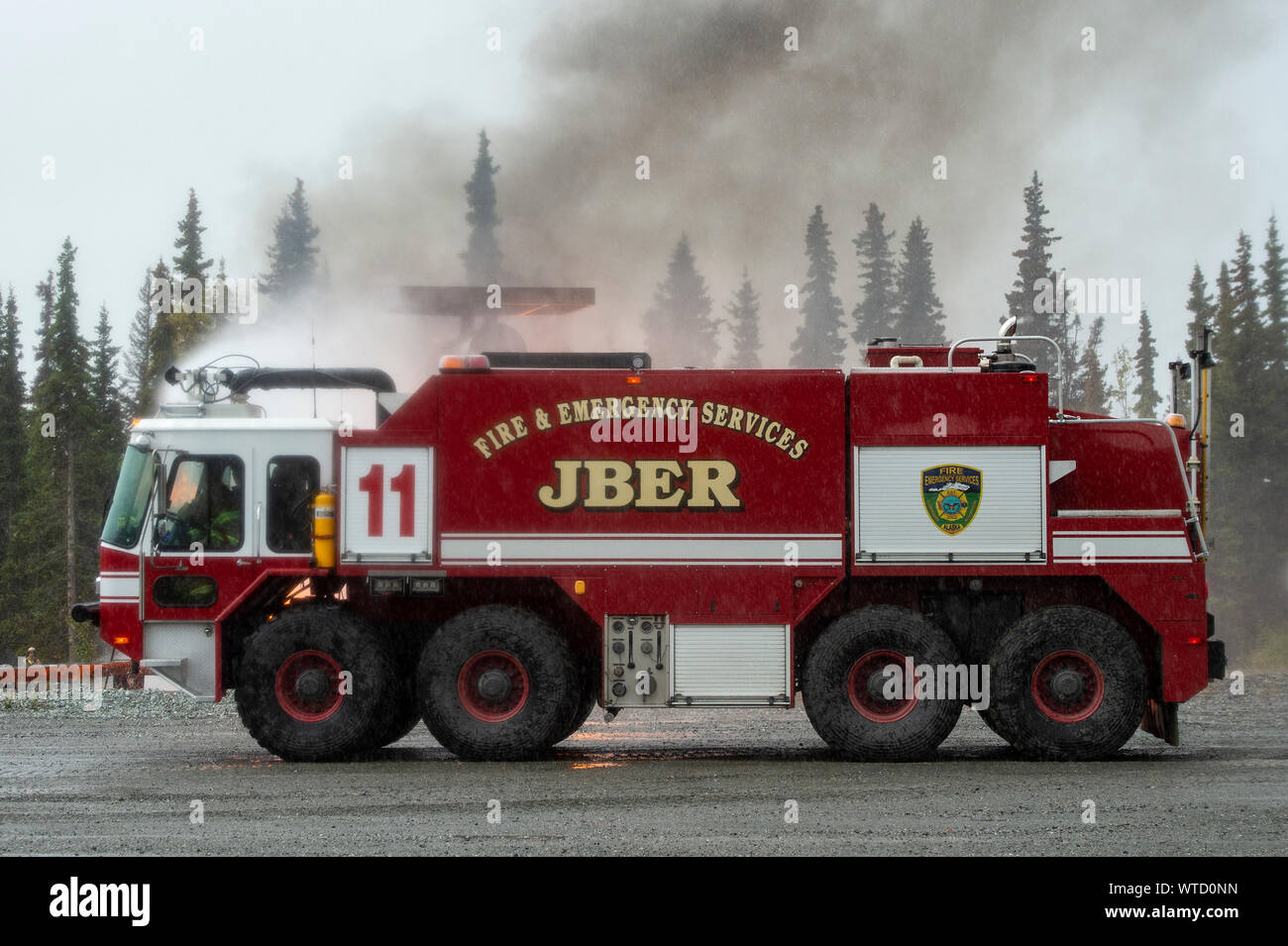U.S. Air Force fire protection specialists with the 673d Civil Engineer ...