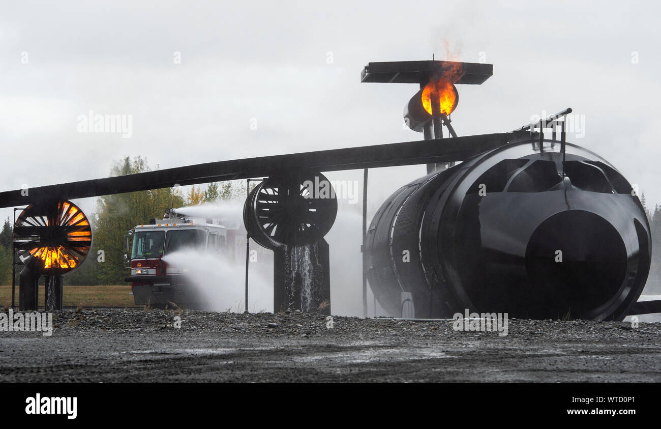 U.S. Air Force fire protection specialists with the 673d Civil Engineer ...