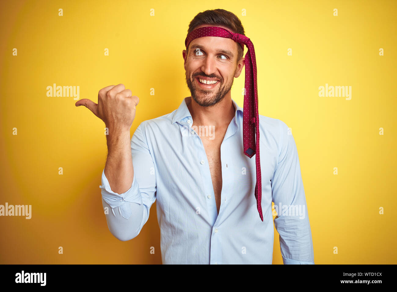 Hangover business man drunk and crazy for hangover wearing tie on head ...