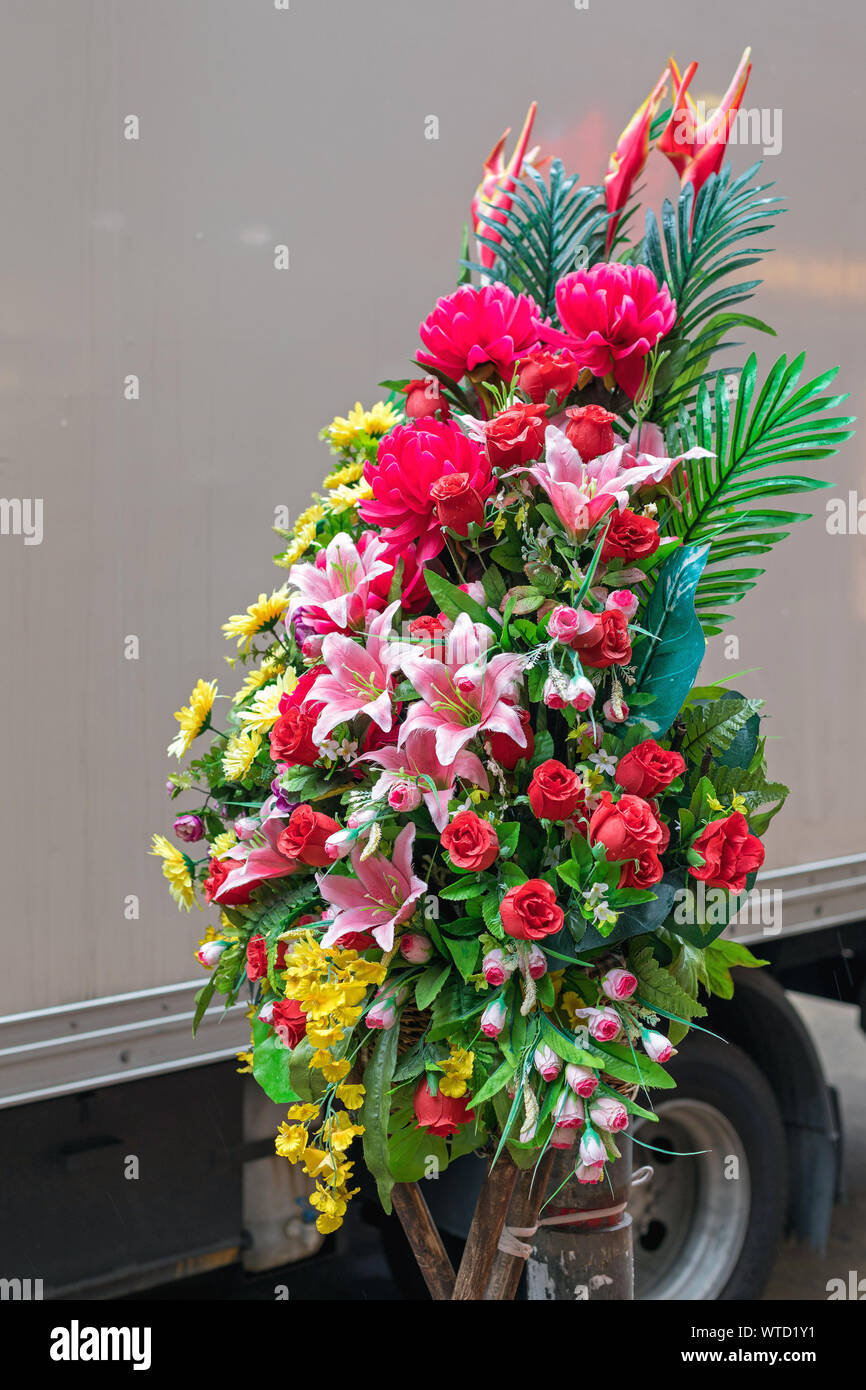 Realistic Bouquet of Artificial Colourful Flowers Decor Stock Photo - Alamy