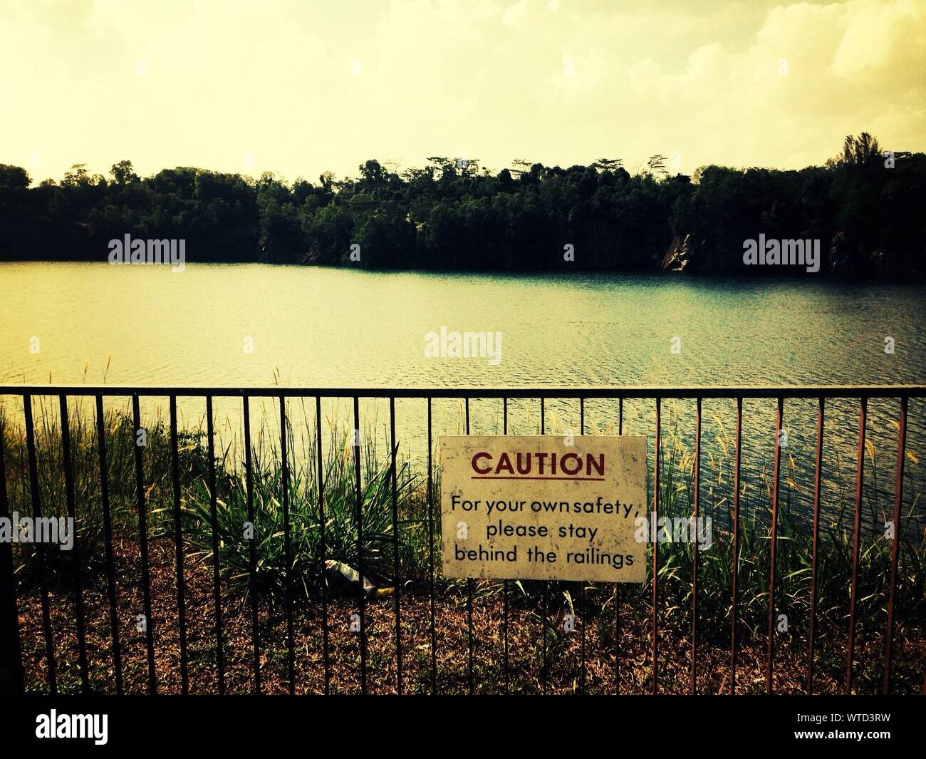 Warning on railing hi-res stock photography and images - Alamy