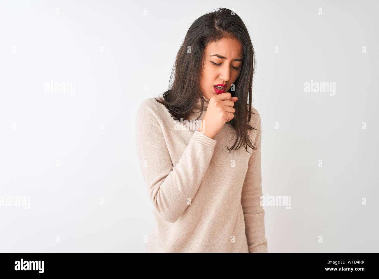 Beautiful chinese woman wearing turtleneck sweater standing over ...