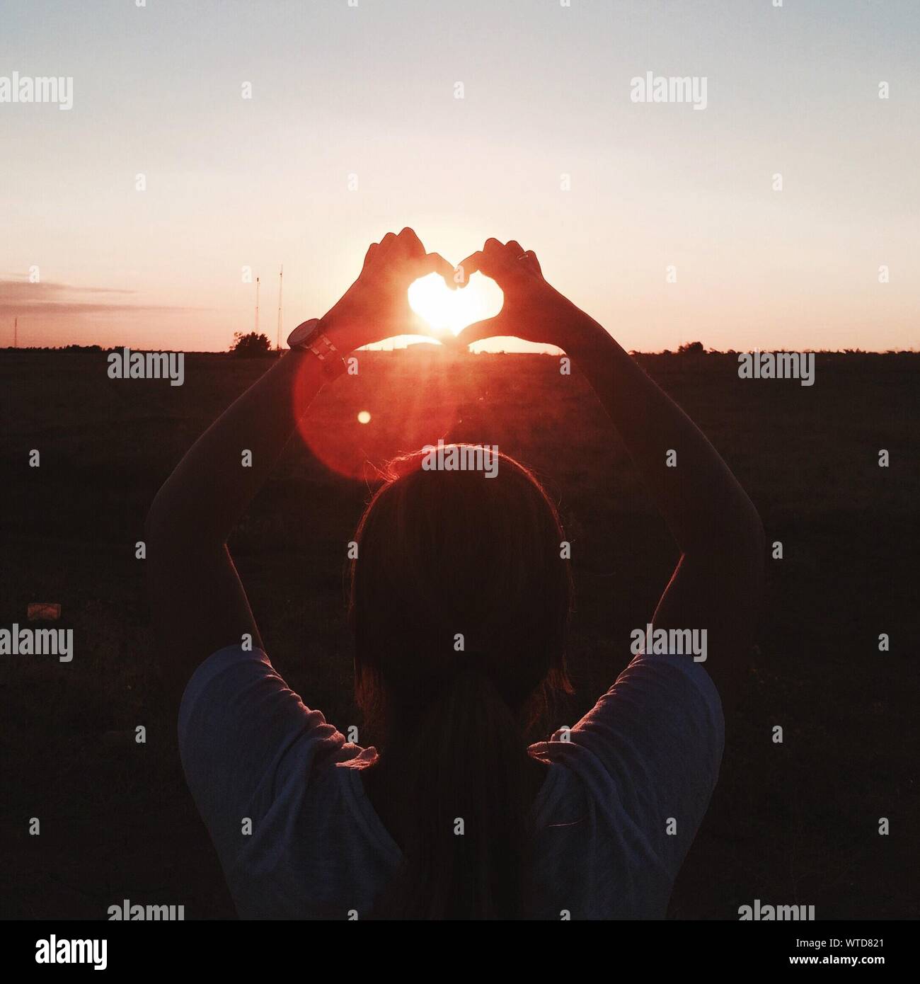 Heart Shape Hands Sun High Resolution Stock Photography and Images - Alamy