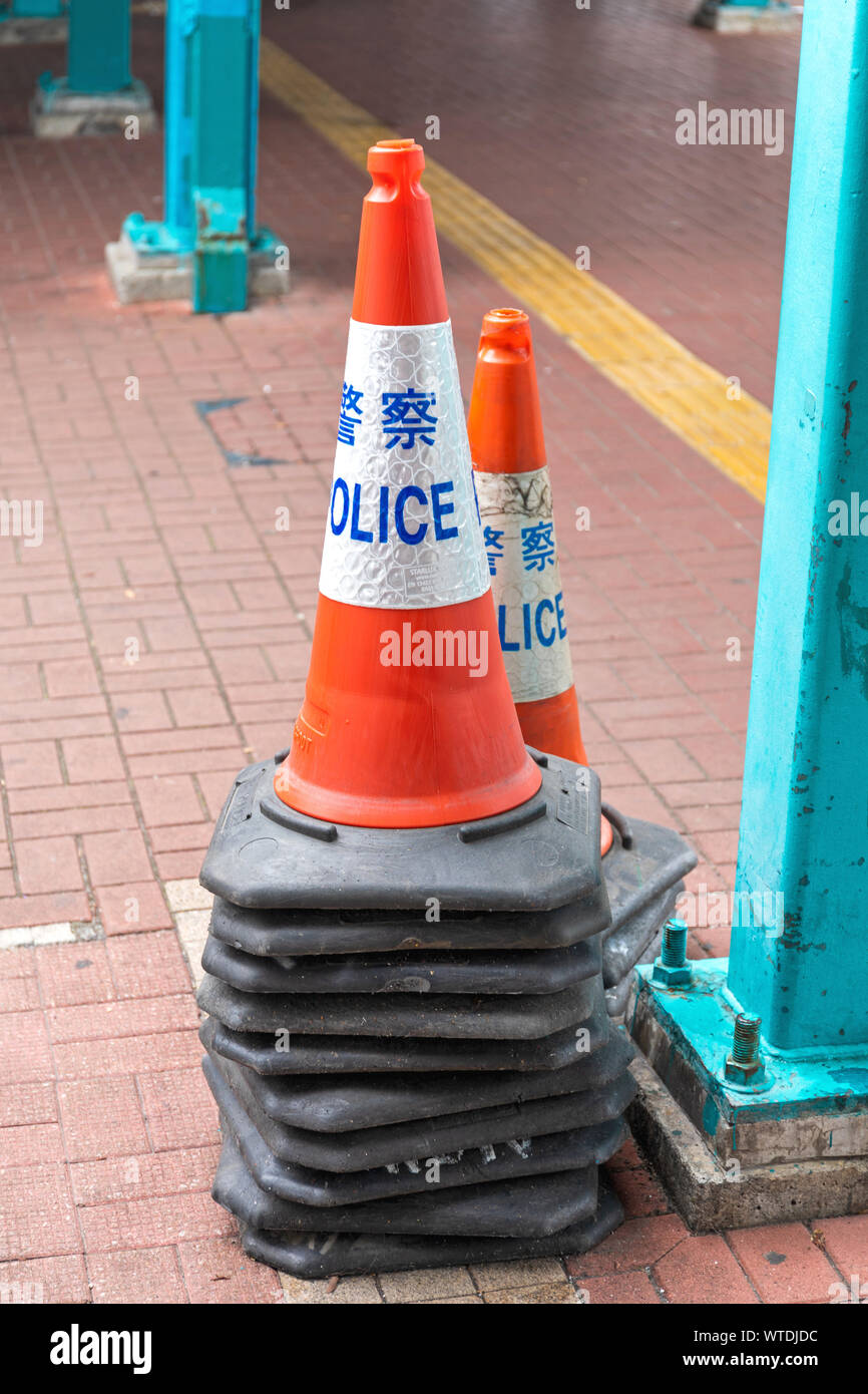 Stacked Traffic Police Cones in Hong Kong Stock Photo - Alamy