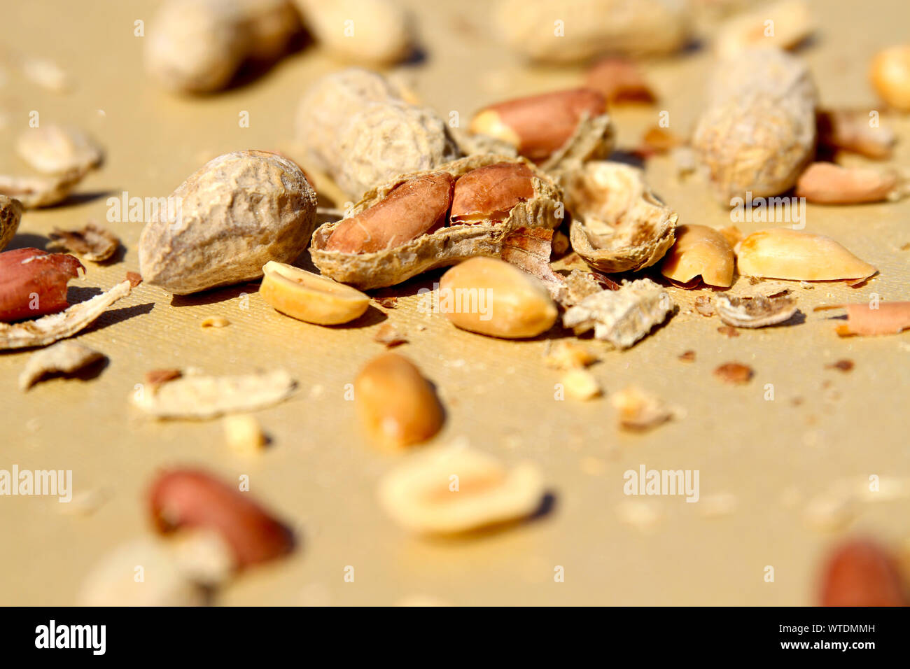 Peanuts and Broken Peanut Shells Stock Photo - Alamy