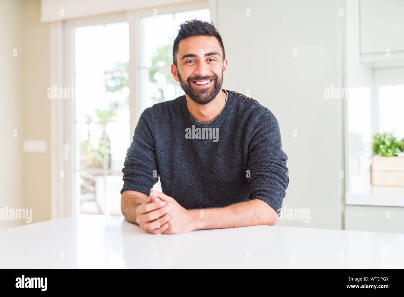 Handsome man smiling cheerful with a big smile on face showing teeth ...