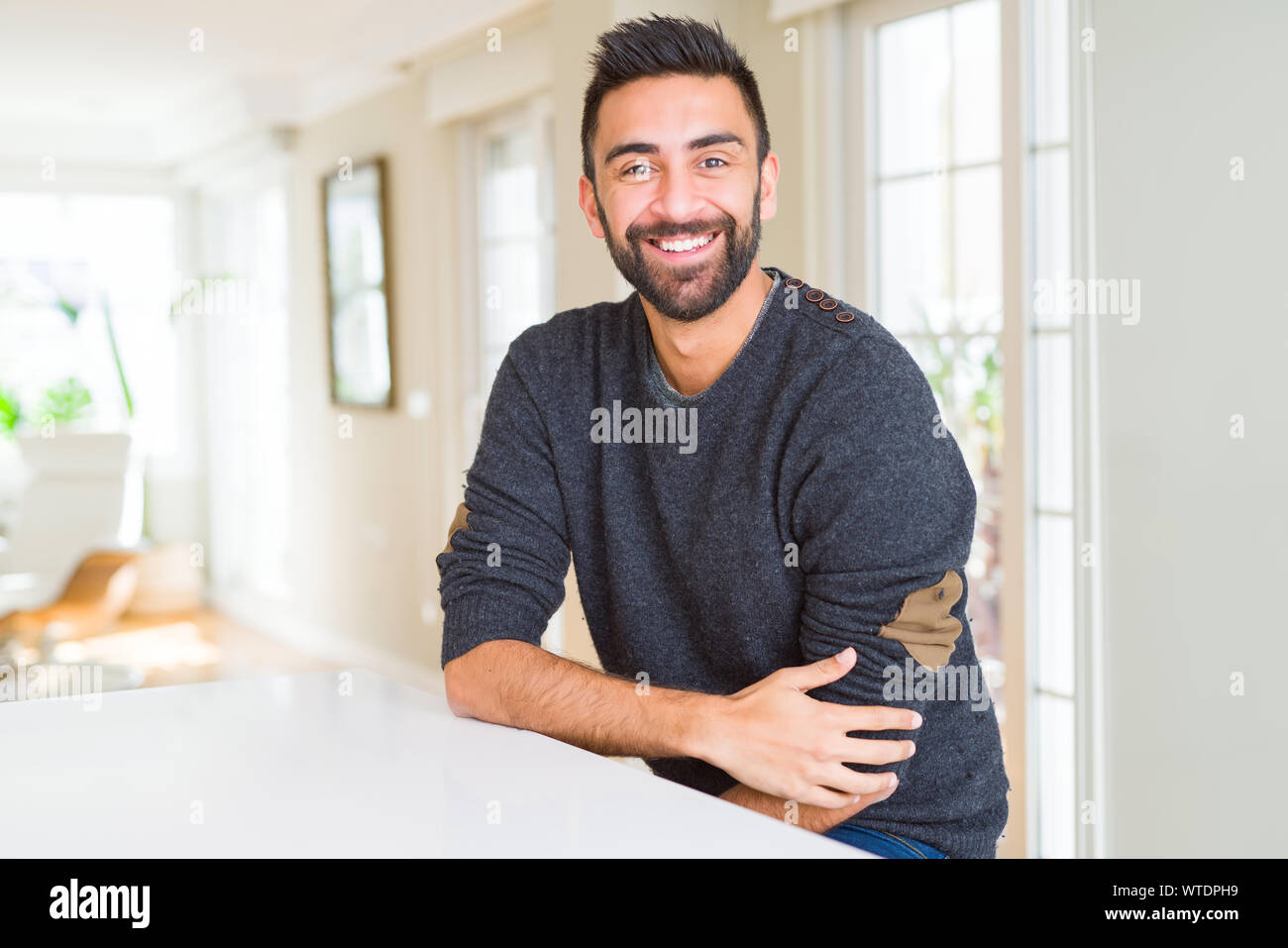 Handsome man smiling cheerful with a big smile on face showing teeth ...