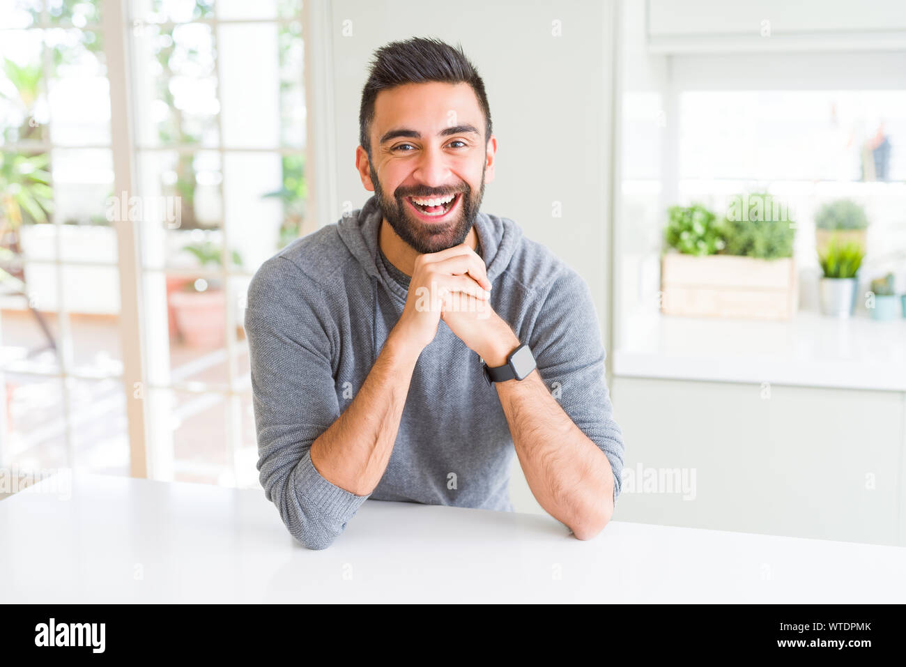 Handsome man smiling cheerful with a big smile on face showing teeth ...