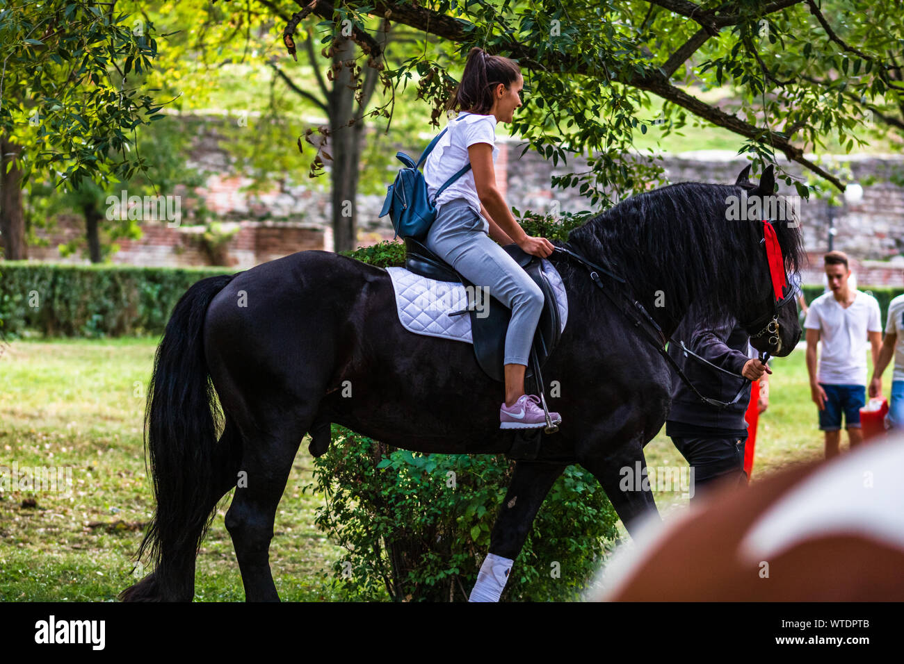 Young girl horseback riding in a park in Targoviste, Romania, 2019 ...