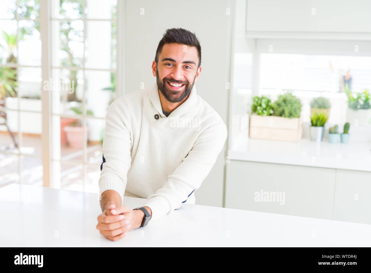 Handsome man smiling cheerful with a big smile on face showing teeth ...