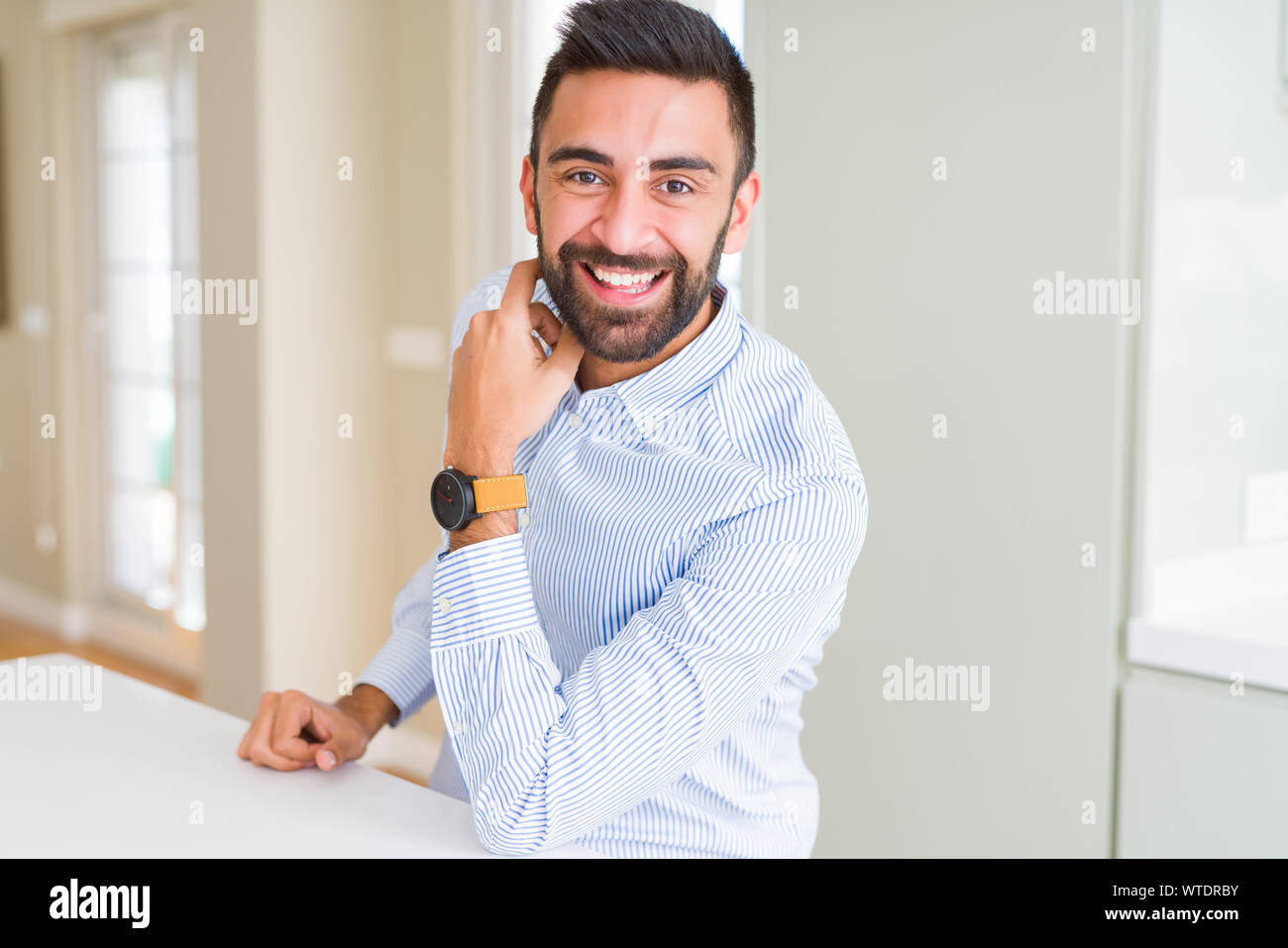 Handsome man smiling cheerful with a big smile on face showing teeth ...