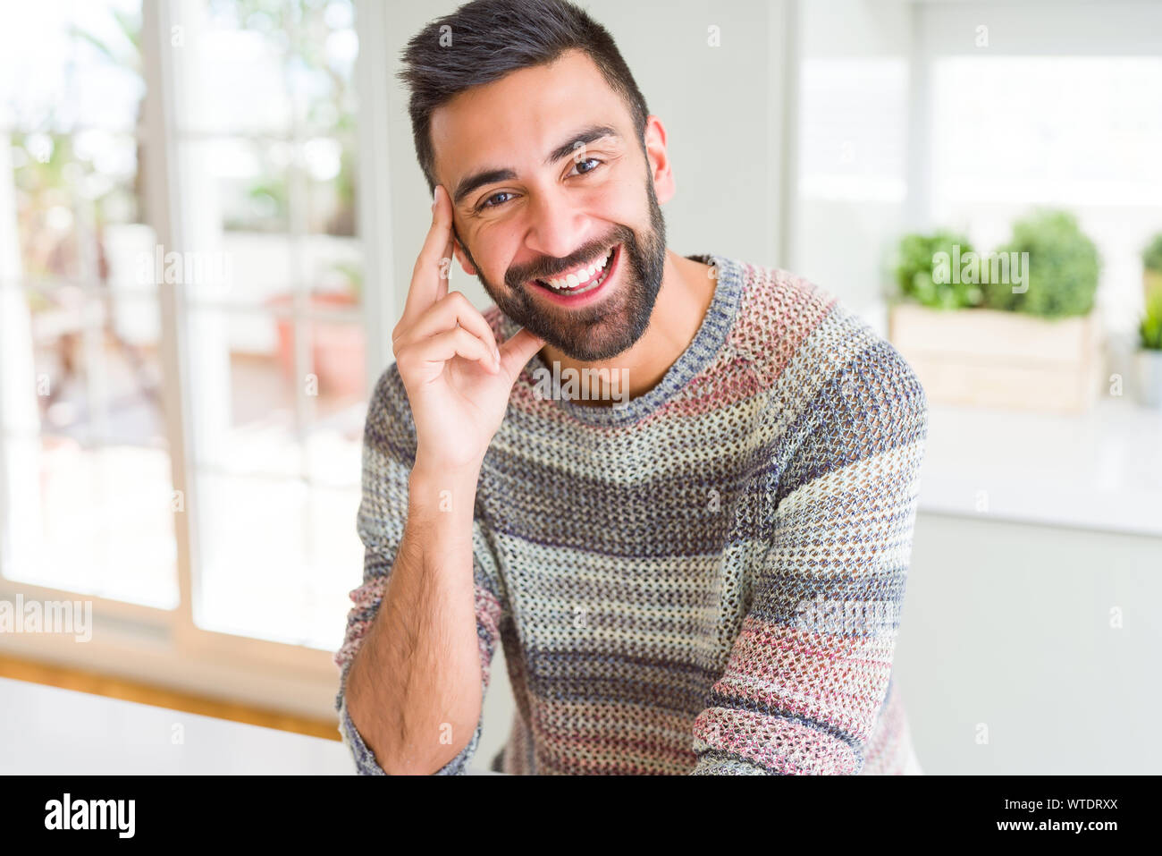 Handsome man smiling cheerful with a big smile on face showing teeth ...
