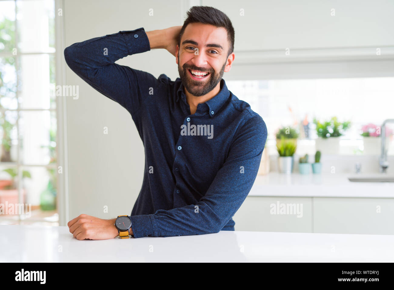 Handsome man smiling cheerful with a big smile on face showing teeth ...