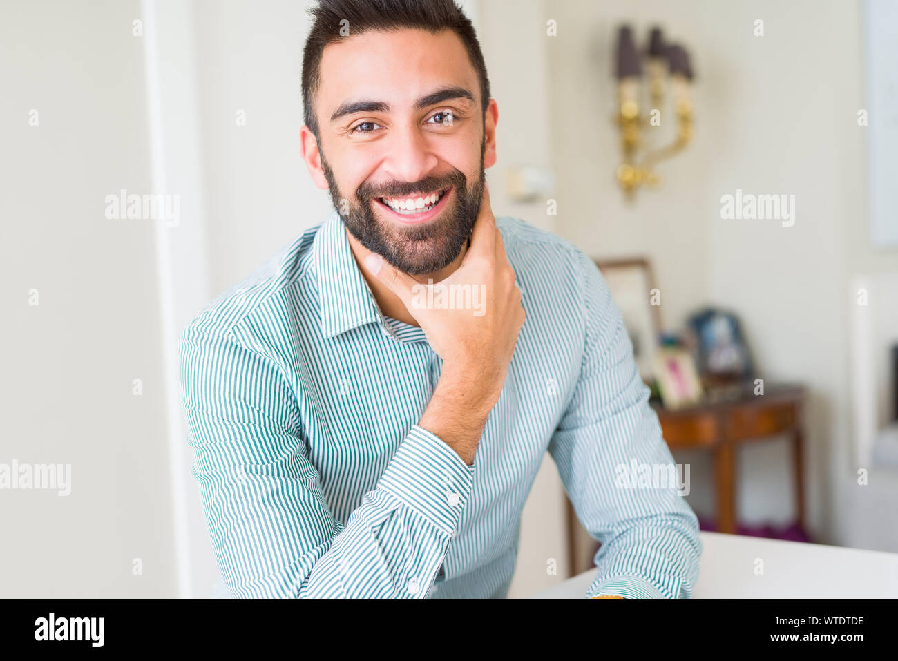 Handsome man smiling cheerful with a big smile on face showing teeth ...