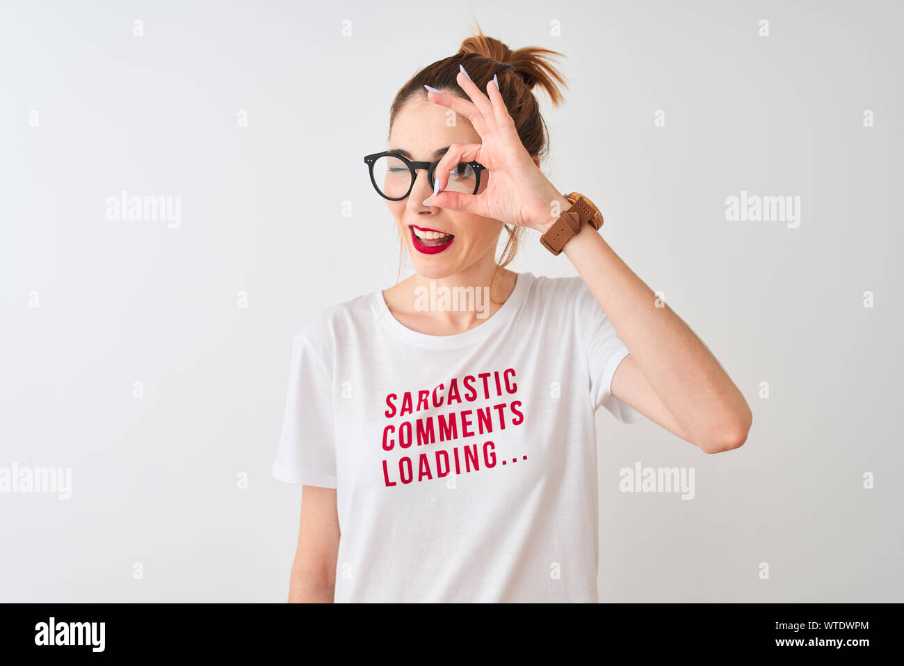 Redhead woman wearing funny t-shirt with irony comments over isolated ...