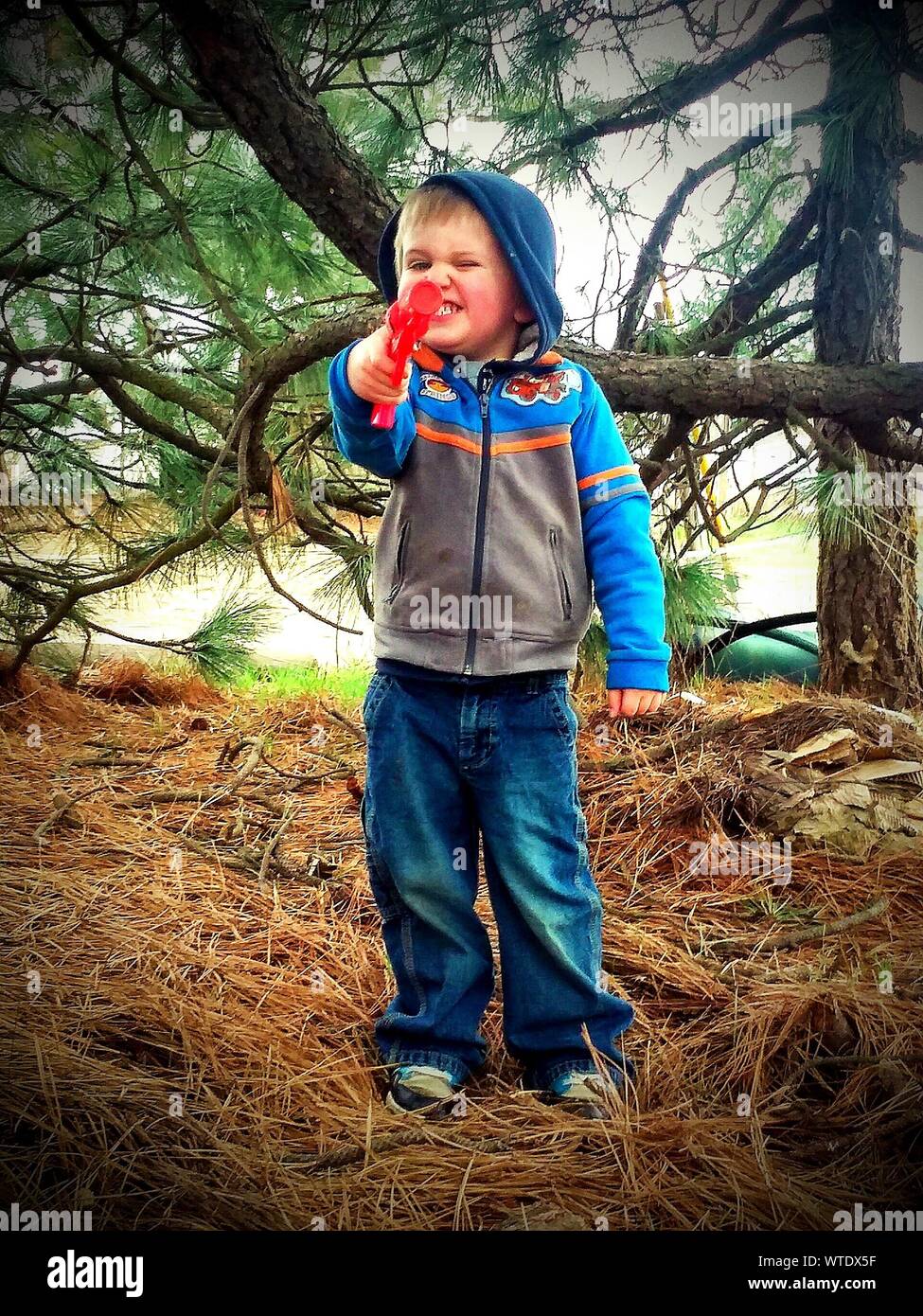 Boy shooting gun hi-res stock photography and images - Alamy