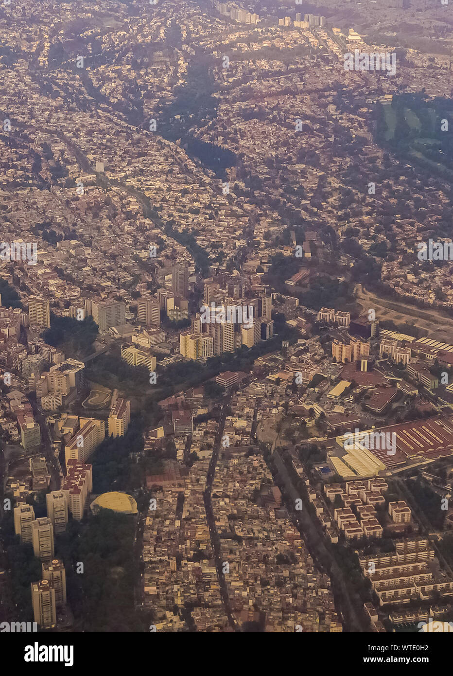 view from a plane of mexico city CDMX with buildings and streets Stock ...