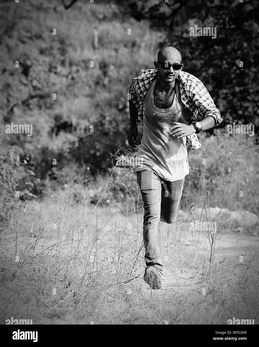 Bald man running hi-res stock photography and images - Alamy