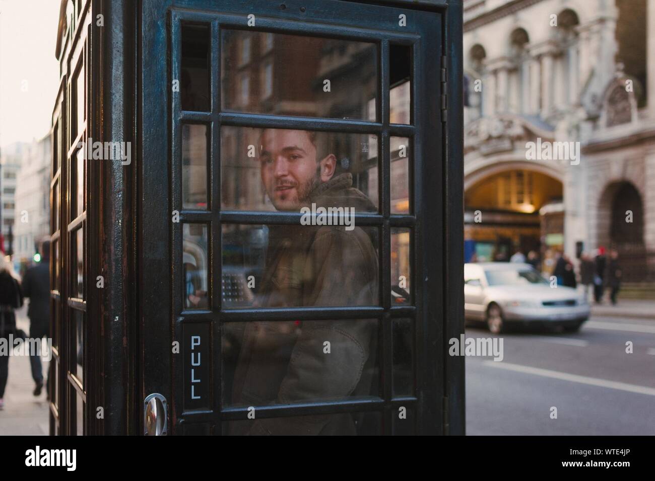 People inside phone booth hi-res stock photography and images - Alamy
