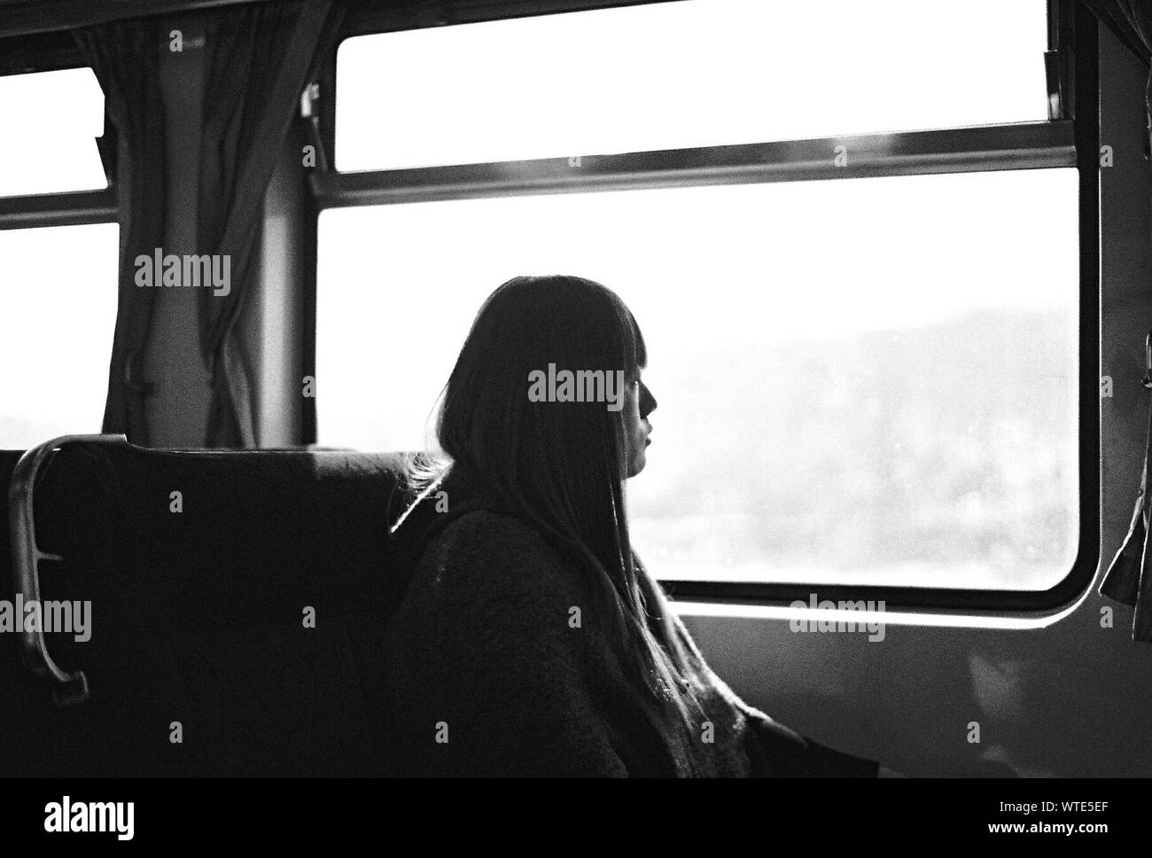 Woman train view window Black and White Stock Photos & Images - Alamy