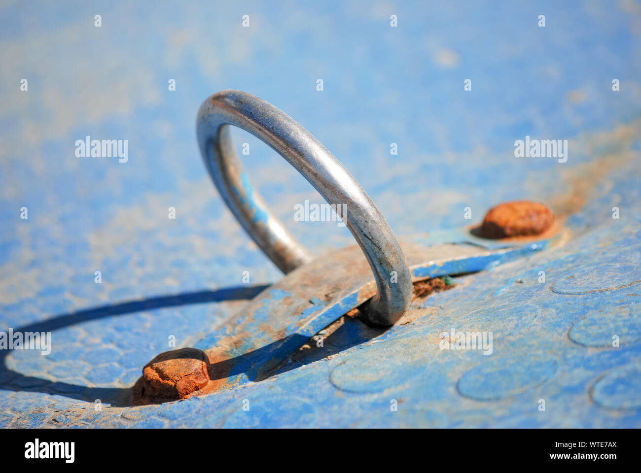 Metal ring. Metal boat mooring ring on a wooden fishing boat Stock ...