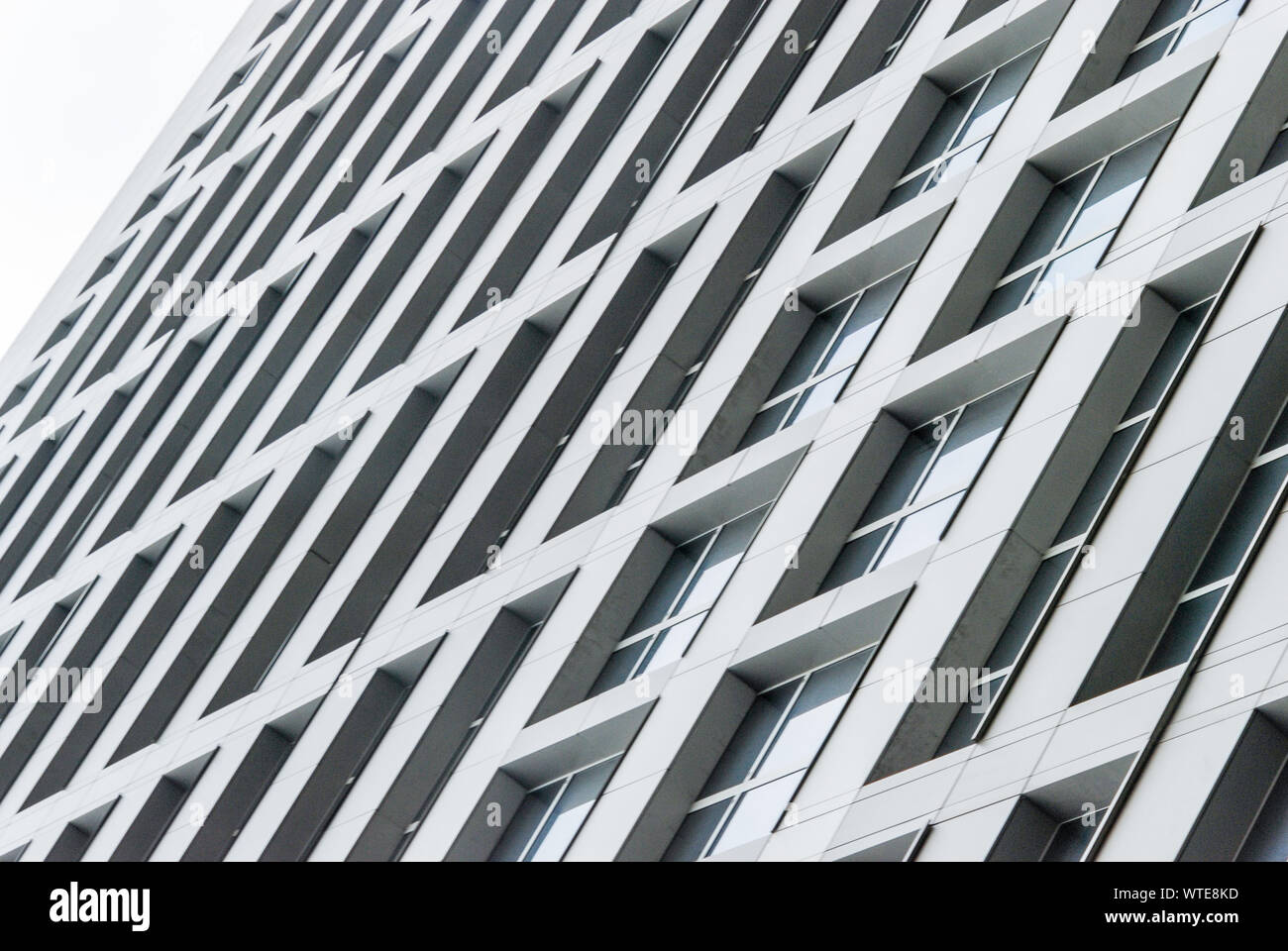 Skyscraper, walls of a high-rise building with windows pattern ...