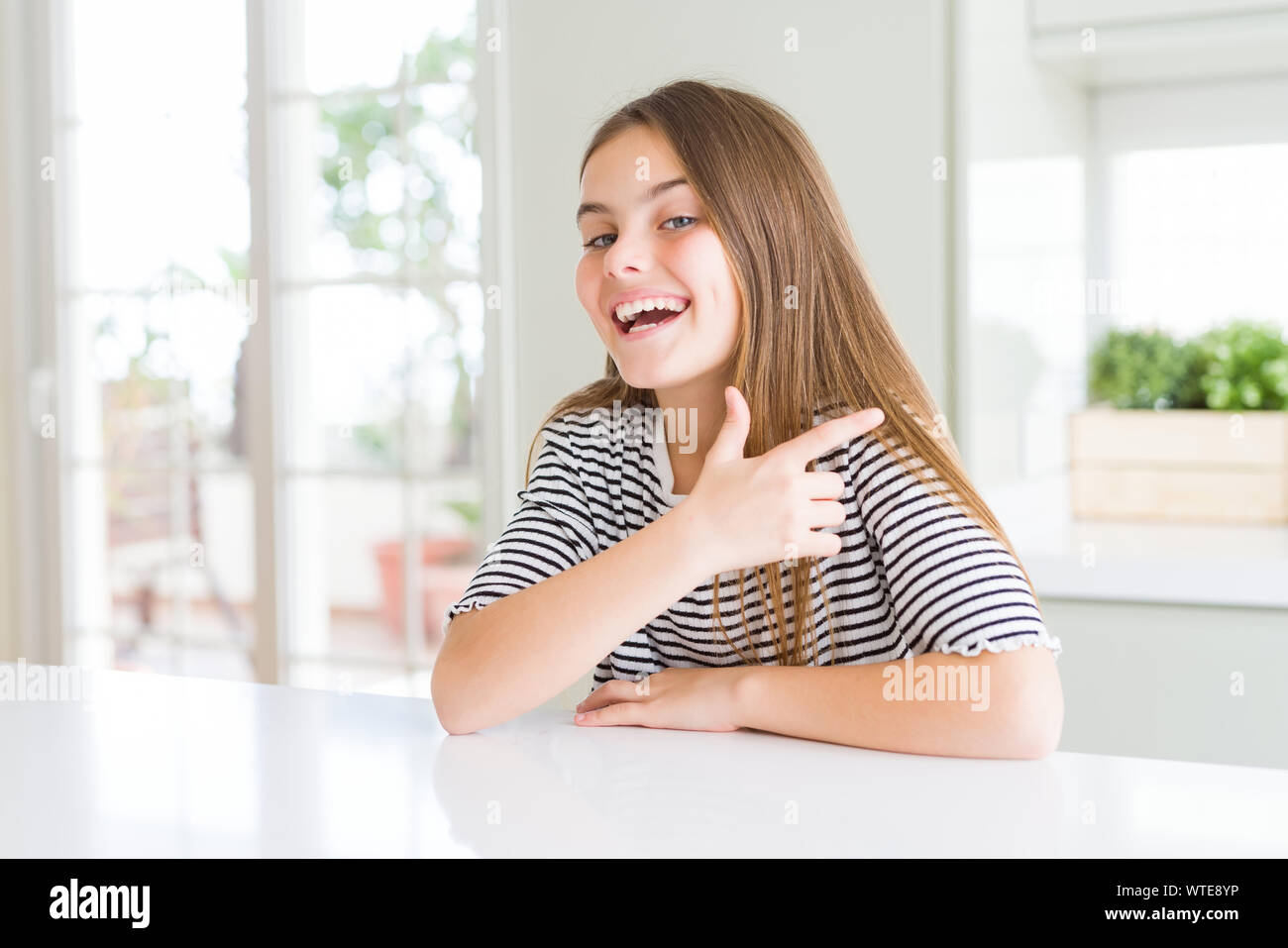 Finger pointing side view bright light hi-res stock photography and ...