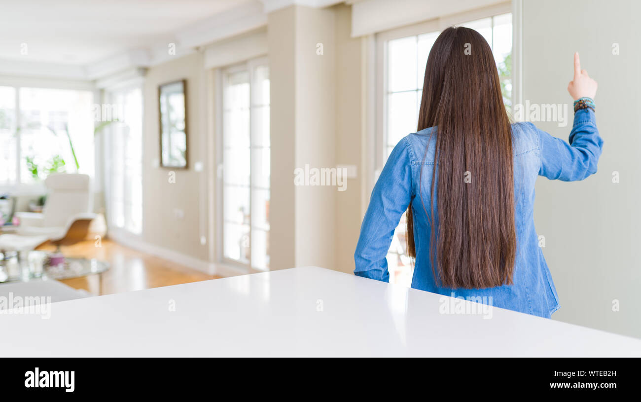 Young beautiful asian woman with long hair wearing denim jacket Posing ...