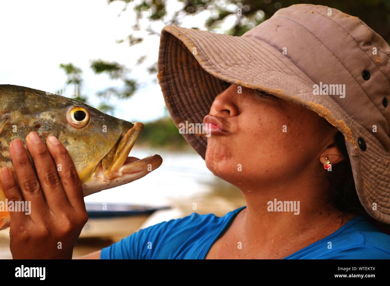 Young asian woman puckering lips hi-res stock photography and images ...