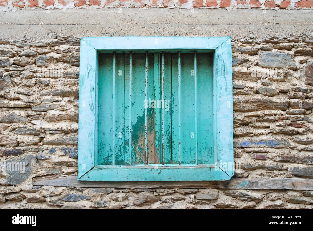 Blue window and shutter on stone brick wall. Background Stock Photo - Alamy