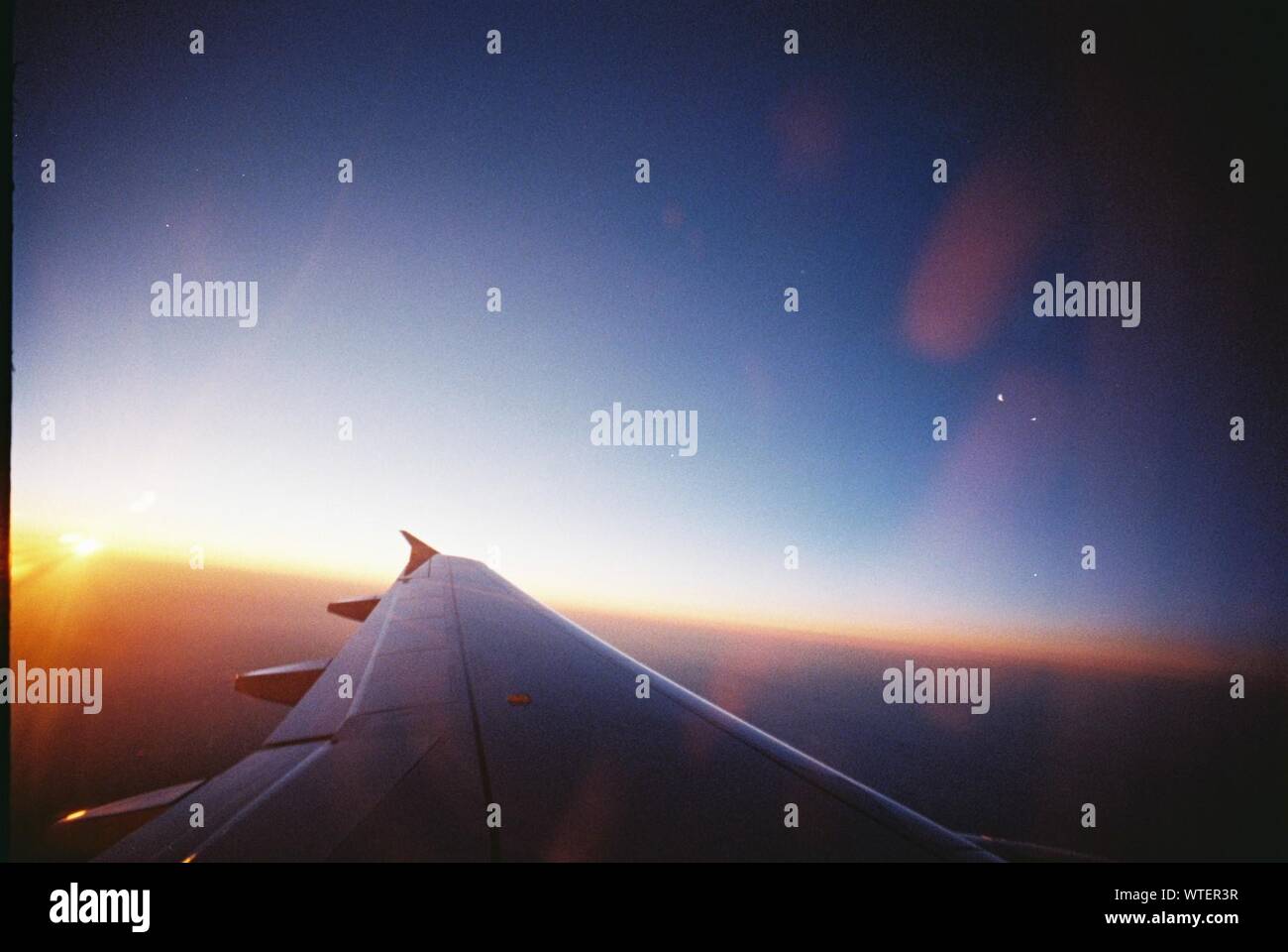 Sunset Airplane Wing High Resolution Stock Photography and Images - Alamy