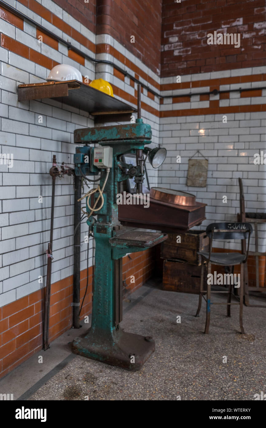 Drill stand in engineering workshop Stock Photo - Alamy