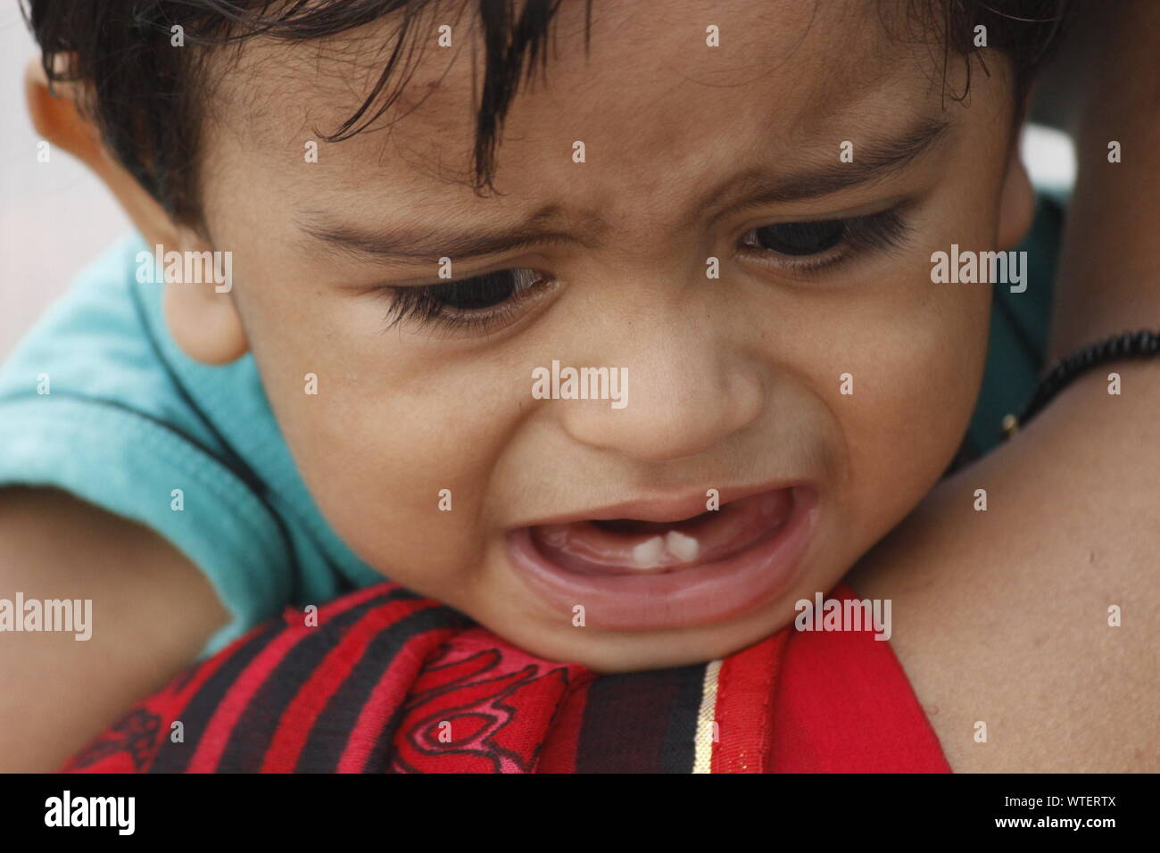 Indian Baby Crying High Resolution Stock Photography and Images - Alamy