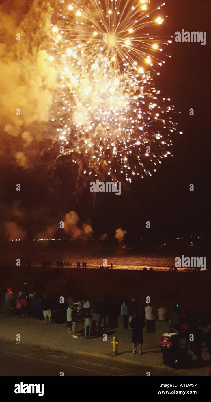 Group of people watching fireworks hi-res stock photography and images ...