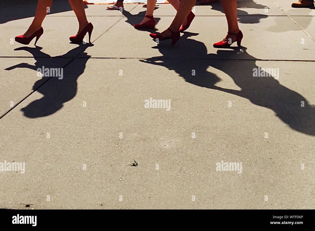 Women Walking In High Heels High Resolution Stock Photography and ...