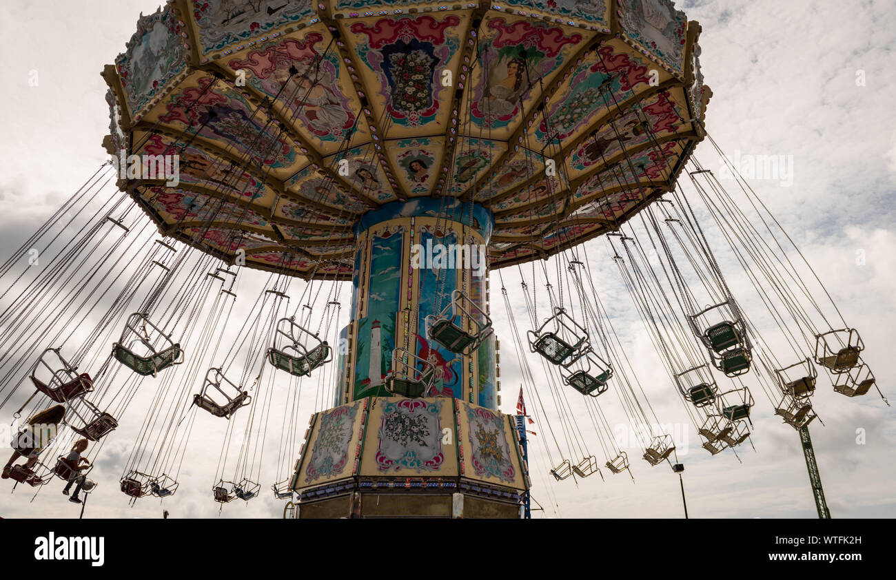 Western fair giant swings Stock Photo - Alamy