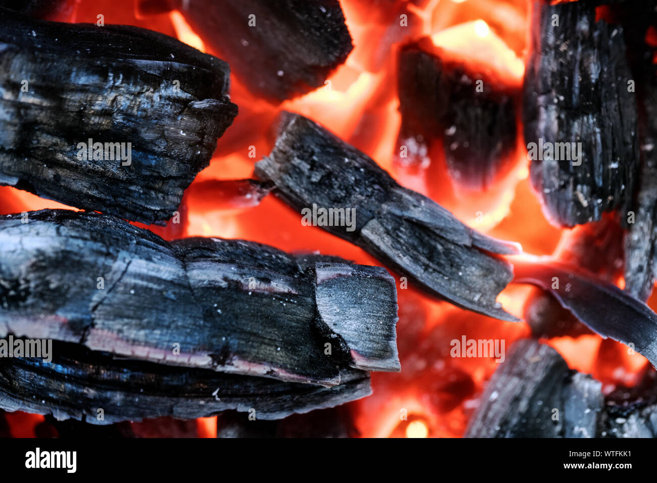 Close up view of the glowing embers of a wood fire Stock Photo - Alamy